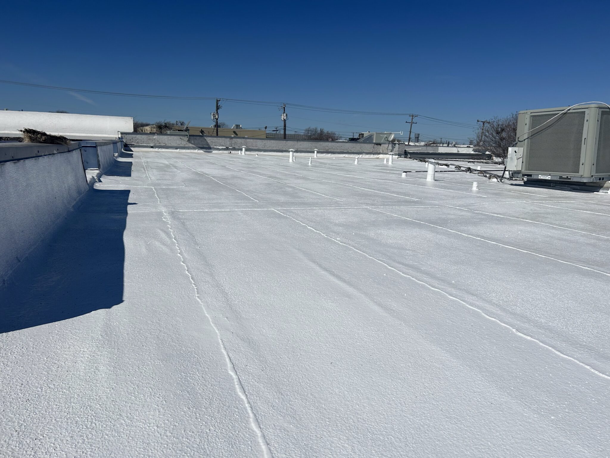 Silicone Roof Coatings vs. Tear-Offs | Progressive Materials